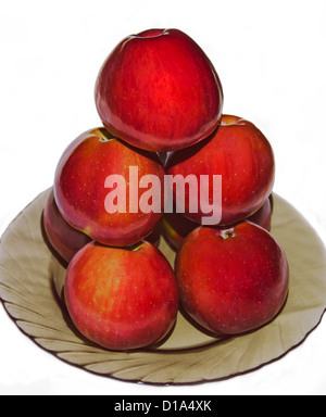 Pyramid of red apples isolated on white background Stock Photo - Alamy