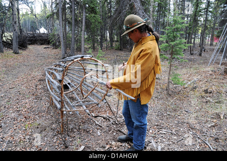 An indigenous elder of the Champagne-Aishihik First Nation sets up a ...