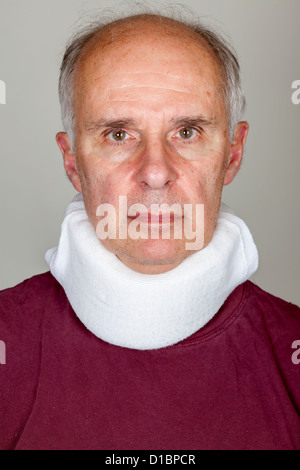 The man in neck brace cervical collar working from home teleworking ...
