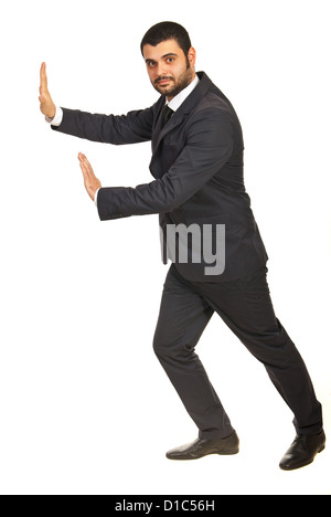 Isolated business man pushing something Stock Photo - Alamy