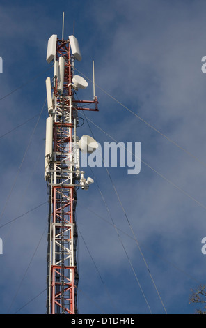 Cell phone relay tower. Metal mast. Metal structure with mounted relays ...
