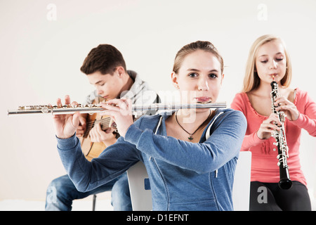 A studio portrait of a musician playing a Oboe instrument Stock Photo ...