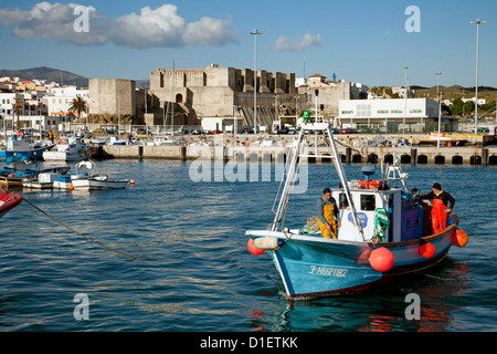 Castle Guzman el Bueno with fishing harbour in the foreground, Tarifa ...