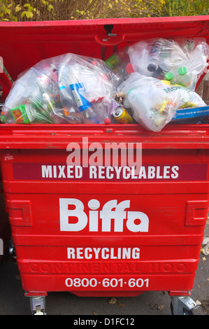 red Biffa recycling skips full of mixed recyclable materials UK Stock ...