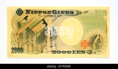 Japanese banknotes. Two thousand Yen note, back and front, laid out ...