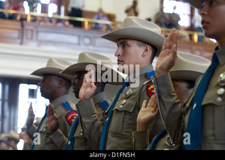 Members of the graduating class of Texas state troopers sit during ...
