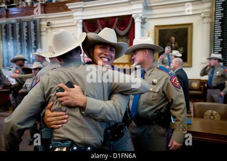 Members of the graduating class of Texas state troopers sit during ...