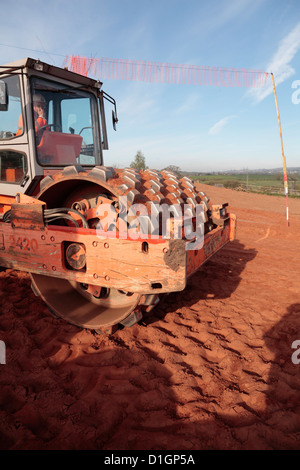 Sheeps foot roller compacting rolling fill material earthmoving ...