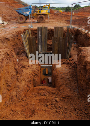 road excavation works at construction site for laying of fibre optic ...