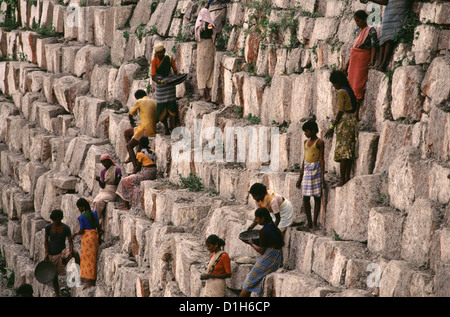 Women working at the Manmatha water tank adjacent to Virupaksha temple ...