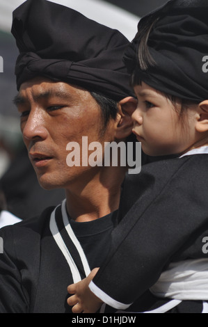 Naha, Okinawa, Japan, men in traditional Okinawan outfit along Kokusai ...