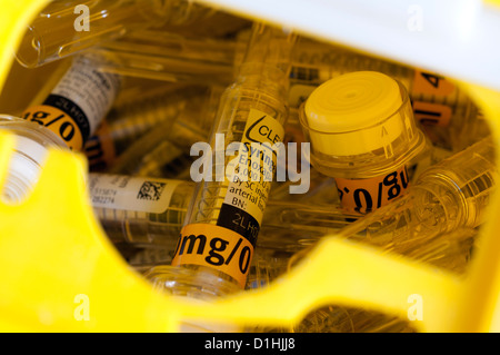 A sharps bin for disposal of used needles and sharps waste Stock Photo ...