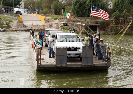 Hand pulled ferry crossing the Rio Grande River from Los Ebanos, TX ...