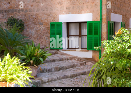 Mallorcan house and garden with shutters Stock Photo - Alamy