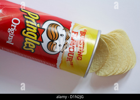 open tub of Pringles Original with contents spilled on white background ...