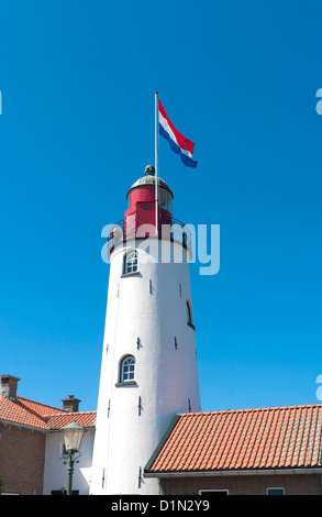Urk Flevoland Netherlands, harbor with the lighthouse on a bright ...