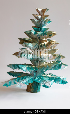 Origami Christmas trees of green craft paper isolated on white ...