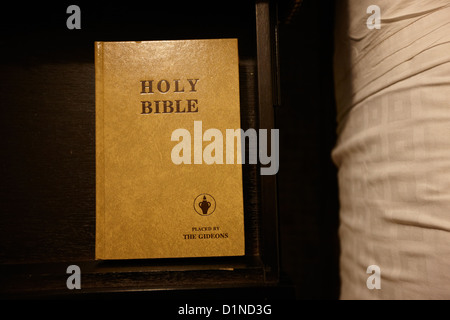 Gideons bible in hotel room bedside drawer Stock Photo - Alamy