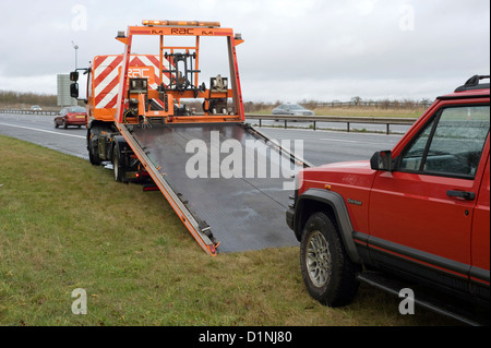 broken down car being loaded onto an rac recovery vehicle Stock Photo ...
