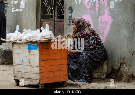 Selling pita bread in the Old City, Cairo, Egypt Stock Photo - Alamy
