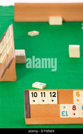 empty rummy table over green background Stock Photo - Alamy