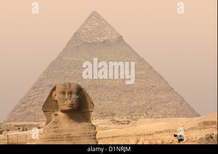 the Giza Necropolis with pyramid and Sphinx at evening time Stock Photo ...