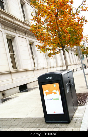 Orange bin and orange leaves Stock Photo - Alamy