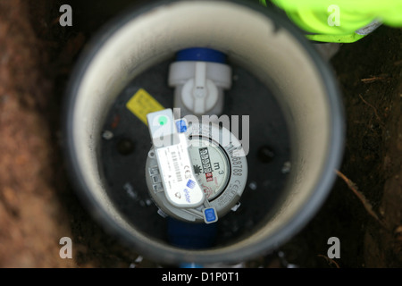Smart water meter installation outside a house in West Sussex Stock ...