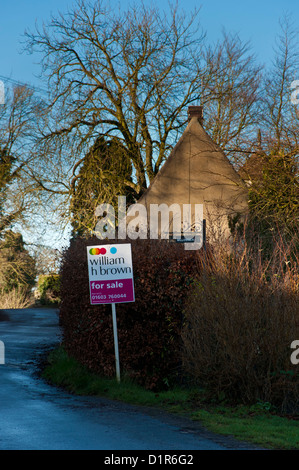 for sale sign on rural country lane Stock Photo - Alamy