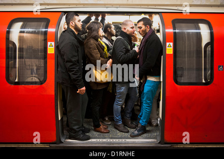 People stagger home on crowded tube trains taking advantage of the free ...
