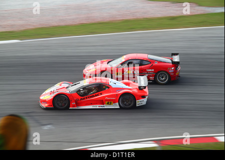 JimGainer Ferrari and Autobacs Aguri competing at Super GT race on June ...