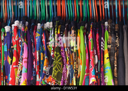 Colorful clothes hanging in wardrobe Stock Photo - Alamy