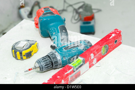 Tools on a wooden table in an old workshop. Arranged on the edge of the ...