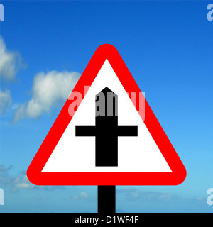Warning sign with crossroads symbol Stock Photo - Alamy