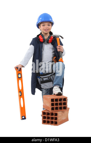 Girl disguised as a mason Stock Photo - Alamy