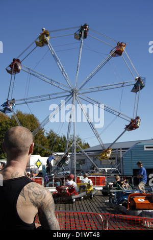 Dodgem cart track in front of ferris wheel at the fairground at Mapua ...