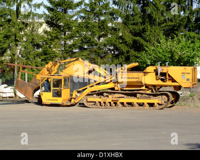 The Dynapac-Hoes 3000 trencher is used in construction for digging ...