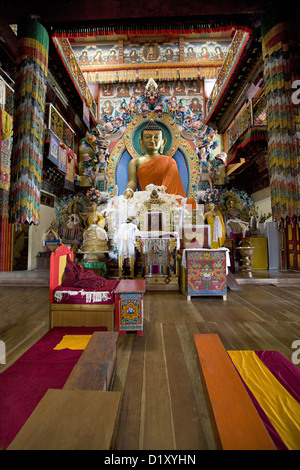 Prayer hall in Tawang Buddhist monastery with pillars covered in prayer ...