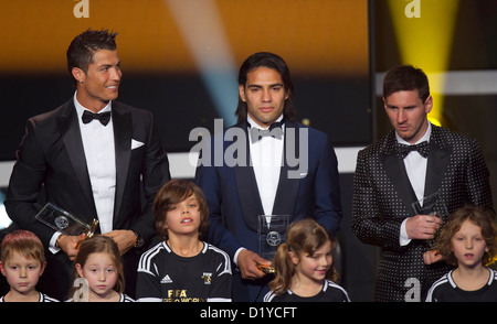 Lionel Messi (R) and Cristiano Ronaldo in action during the Riyadh All ...