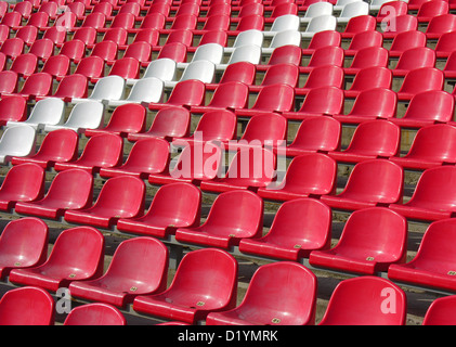 White stadium seats with stairs. Soccer, football or baseball stadium ...