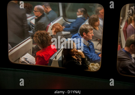Passengers on a Washington subway train Stock Photo - Alamy