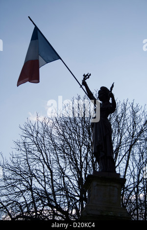 Statue of Marianne with french flag in city hall. Marianne is the ...