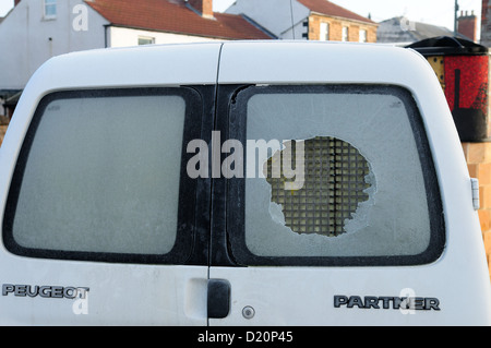 White Van With Rear Window Smashed Stock Photo - Alamy
