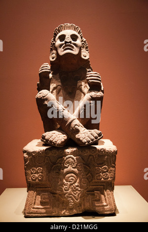 MEXICO CITY: Stone statue of Xochipilli, god of art, games, beauty ...