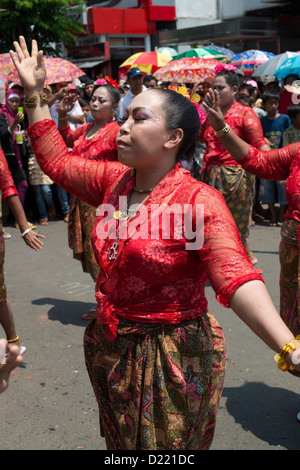 Indonesian woman in carnival costume celebrating Malan's 101st year ...