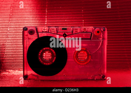 Transparent Cassette tape and red color disco lights background Stock ...