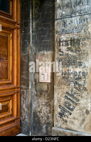 Vertical shot of ancient inscriptions on the wall Stock Photo - Alamy