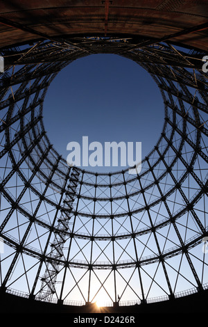 Berlin, Germany, the silhouette of the Gasometer Schoeneberg at dusk ...