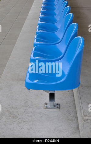 Germany, Bavaria, Munich, Stand with blue and yellow plastic seats ...