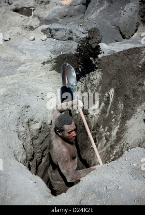 Man Digging To Find Megapode Birds Eggs In Tavurvur Volcano Sands ...